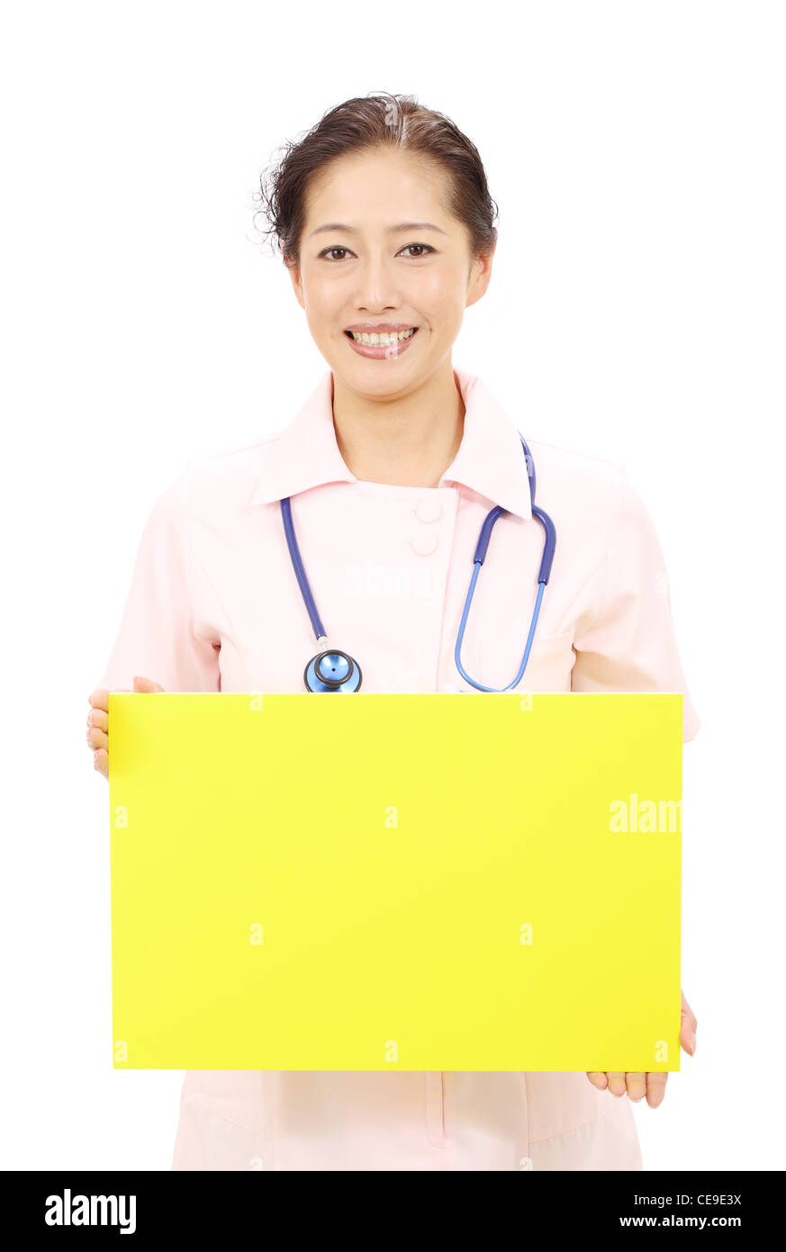 Nurse showing medical sign billboard standing hi-res stock photography ...
