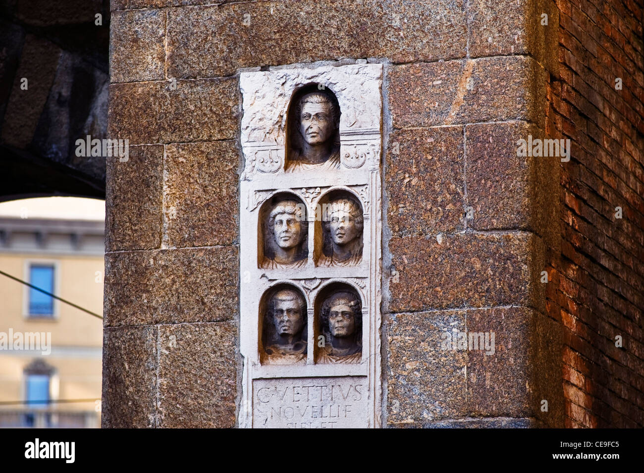 faces of roman figures in milan, italy Stock Photo - Alamy