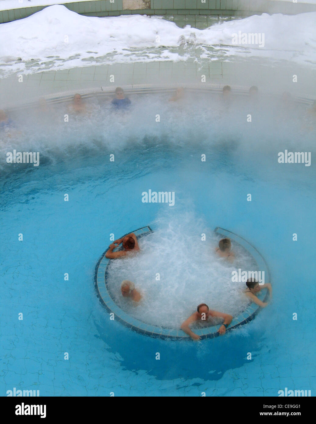 People bath in the medicinal hot water spring pool of Walliser ...