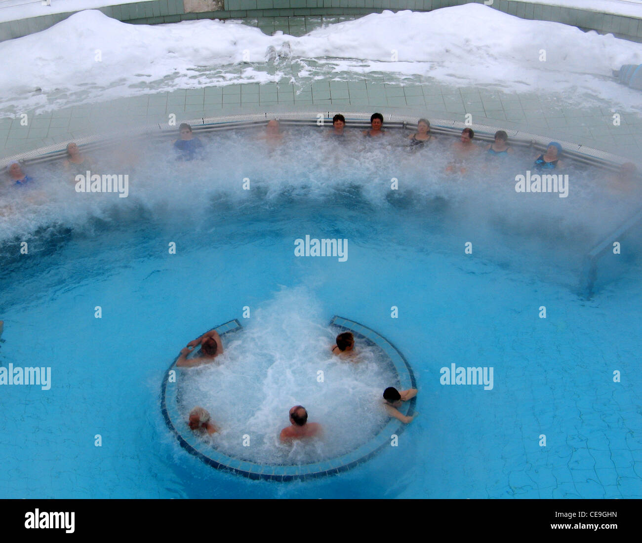 People bath in the medicinal hot water spring pool of Walliser ...