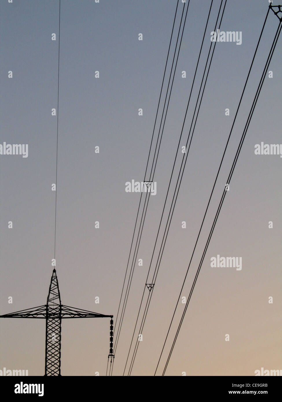 High voltage power transmission lines and electrical pylon Stock Photo ...