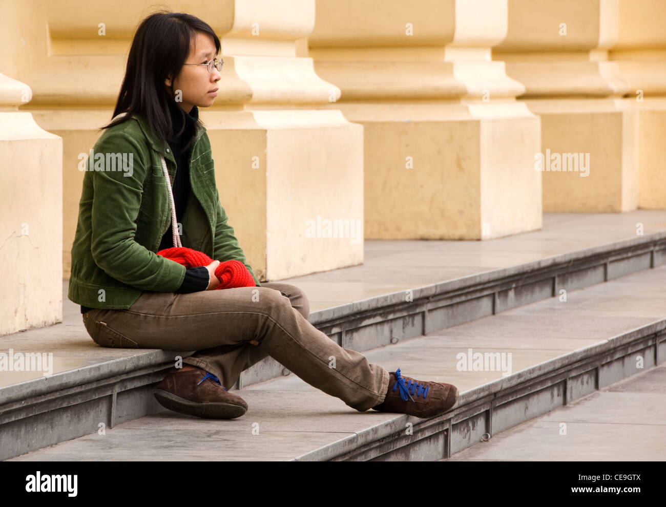 Young Vietnamese woman sitting on steps, Hanoi, Viet Nam Stock Photo ...