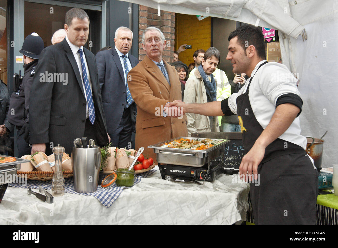Prince Charles tries Italian food, prepared by Alessio Garau (right ...