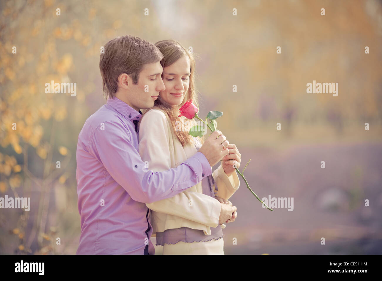 low contrast image of a happy young couple spending time outdoor in the ...