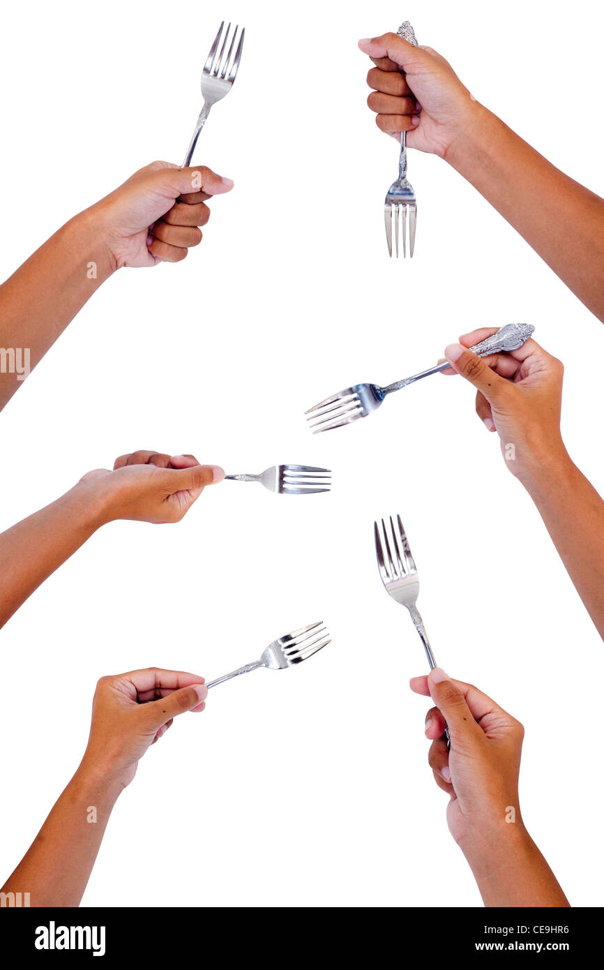 conceptual image of hand holding isolated fork Stock Photo - Alamy