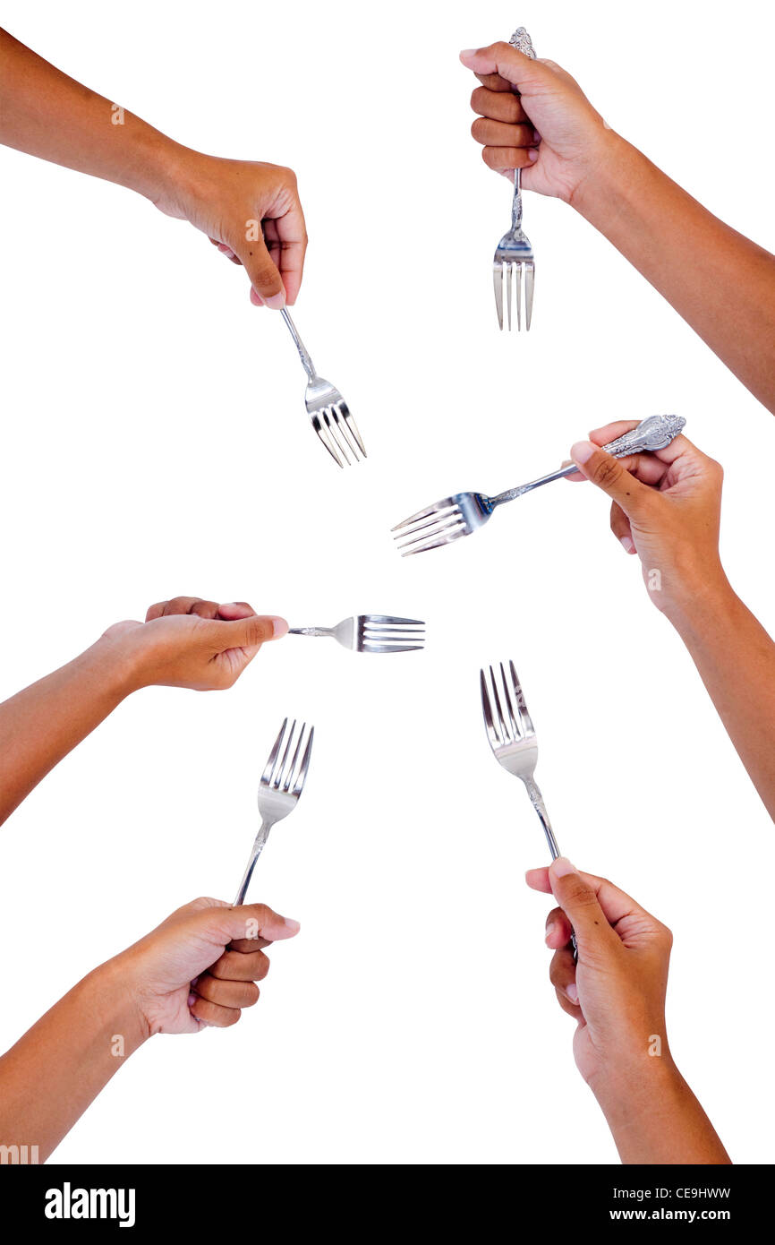 conceptual image of hand holding isolated fork Stock Photo - Alamy