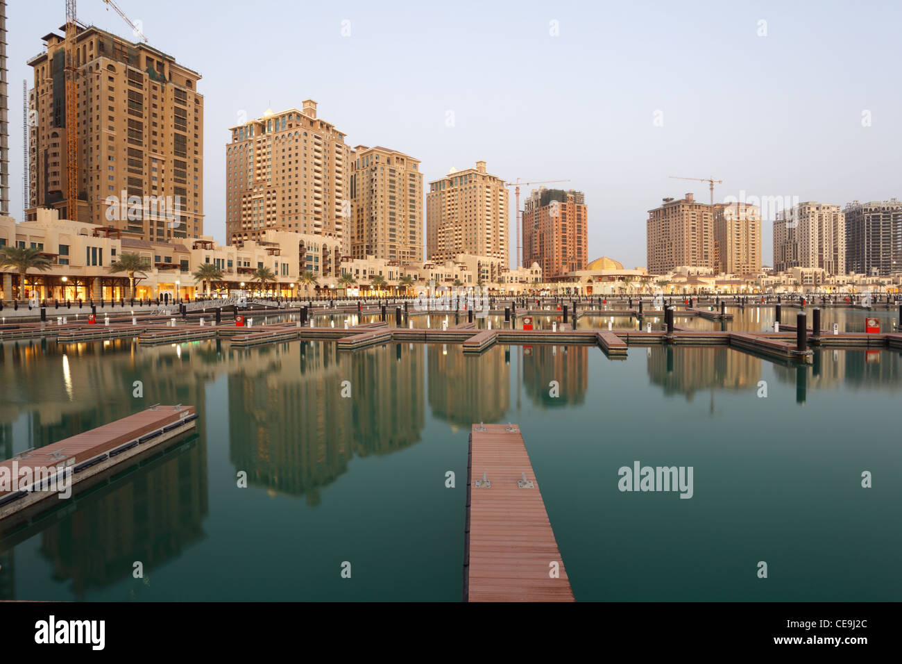 Residential buildings and empty Marina at The Pearl in Doha, Qatar ...