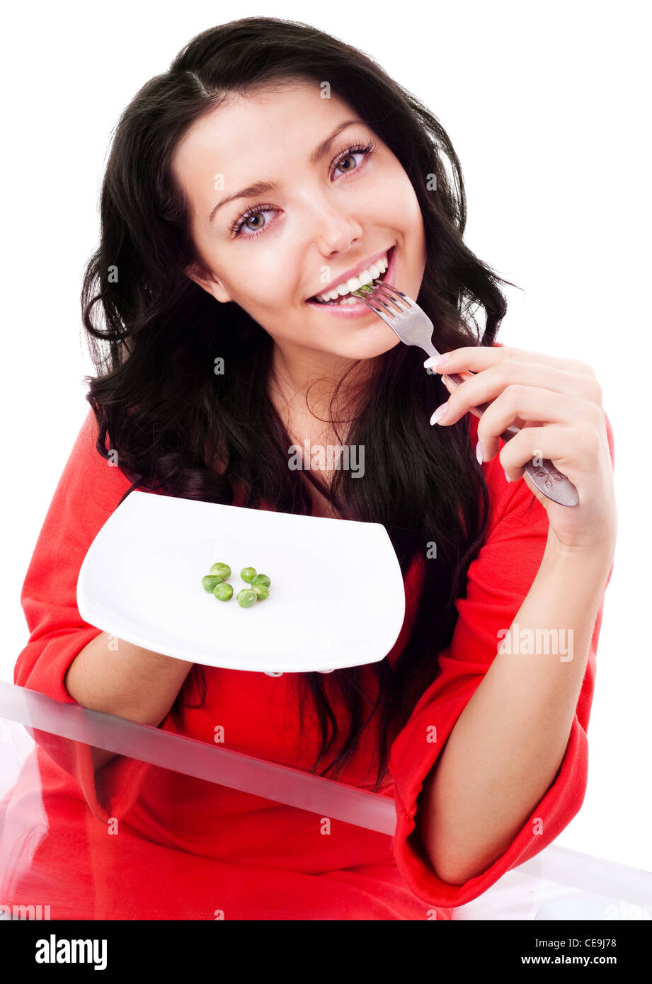 Woman eating peas fork hi-res stock photography and images - Alamy