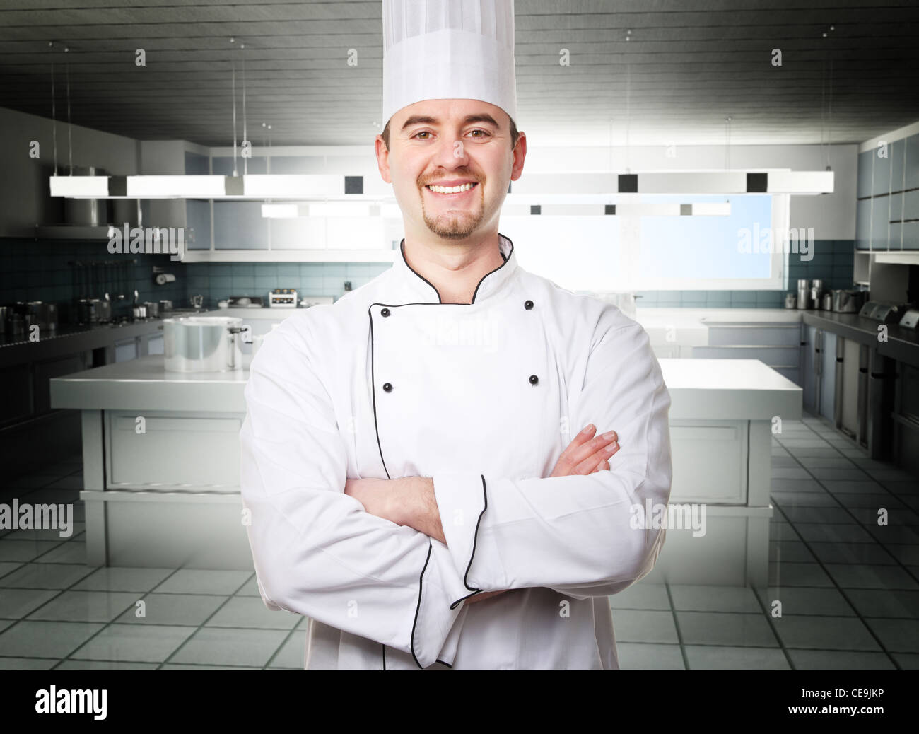 portrait of chef in modern kitchen Stock Photo - Alamy