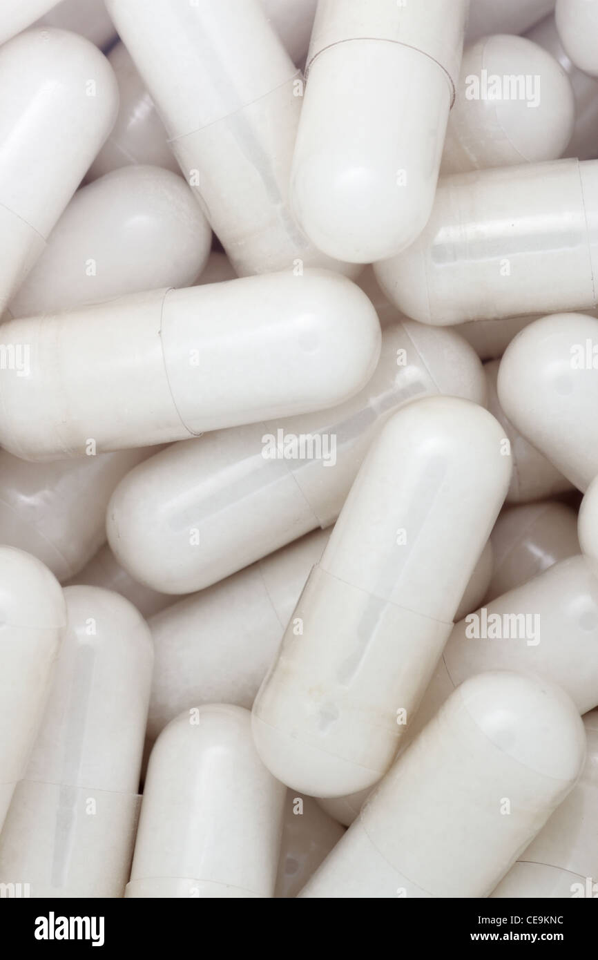 A closeup of a group of dietary supplement capsules Stock Photo - Alamy