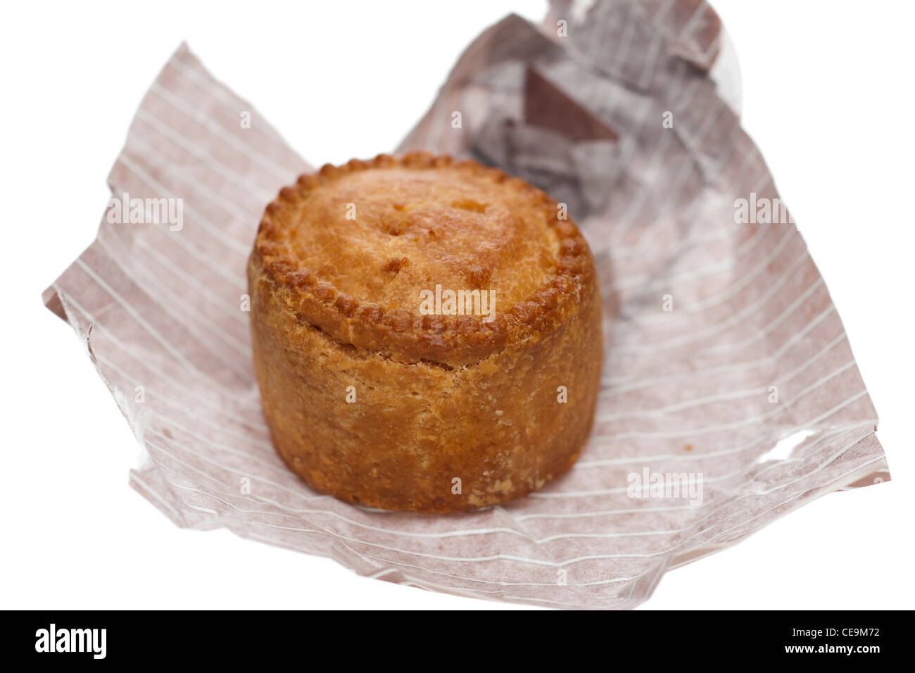 Small pork pie on wrapping paper Stock Photo - Alamy