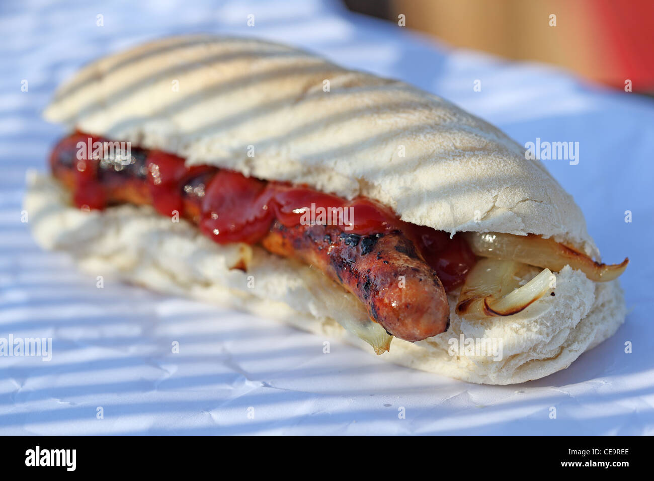 sandwich sausage barm eating on the street Stock Photo - Alamy
