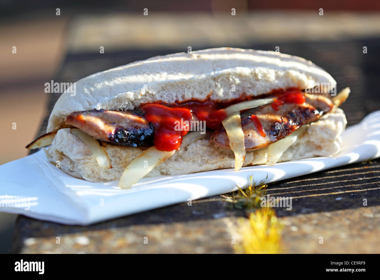 sandwich sausage barm eating on the street Stock Photo - Alamy