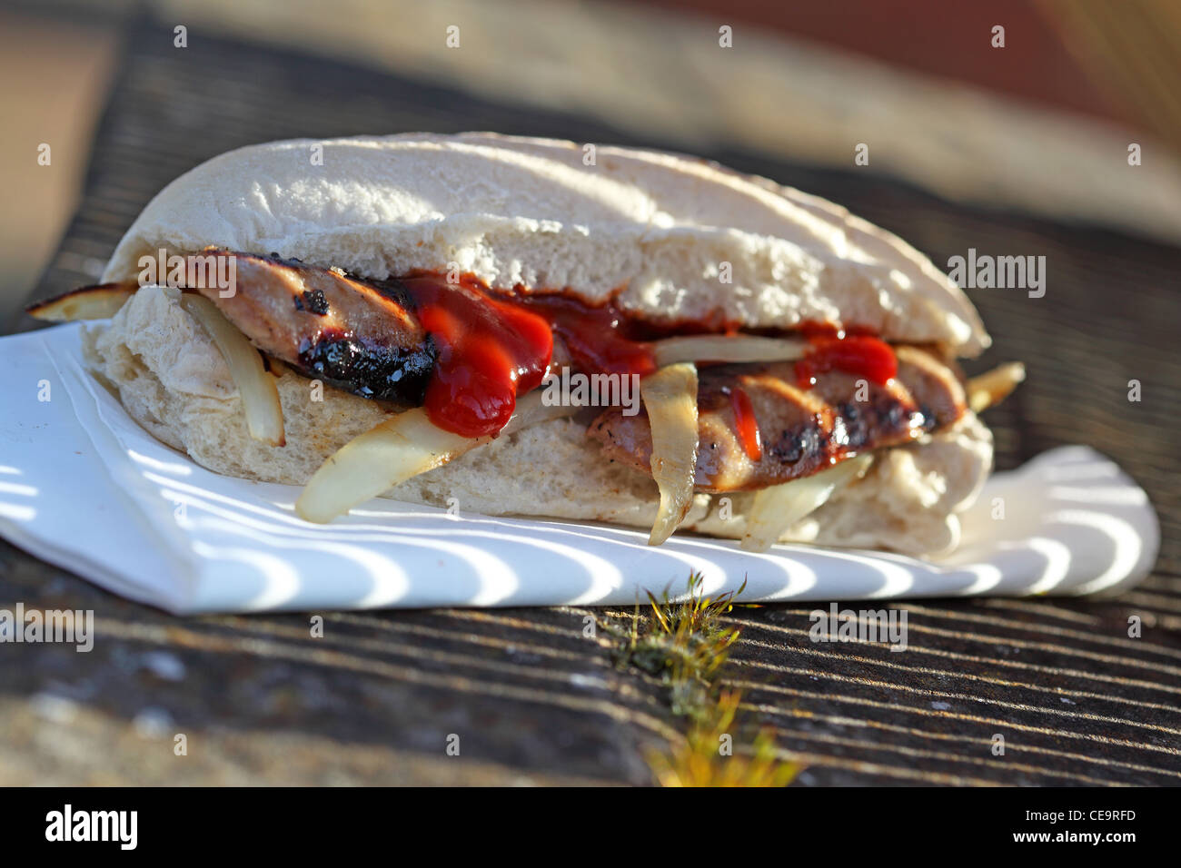 sandwich sausage barm eating on the street Stock Photo - Alamy