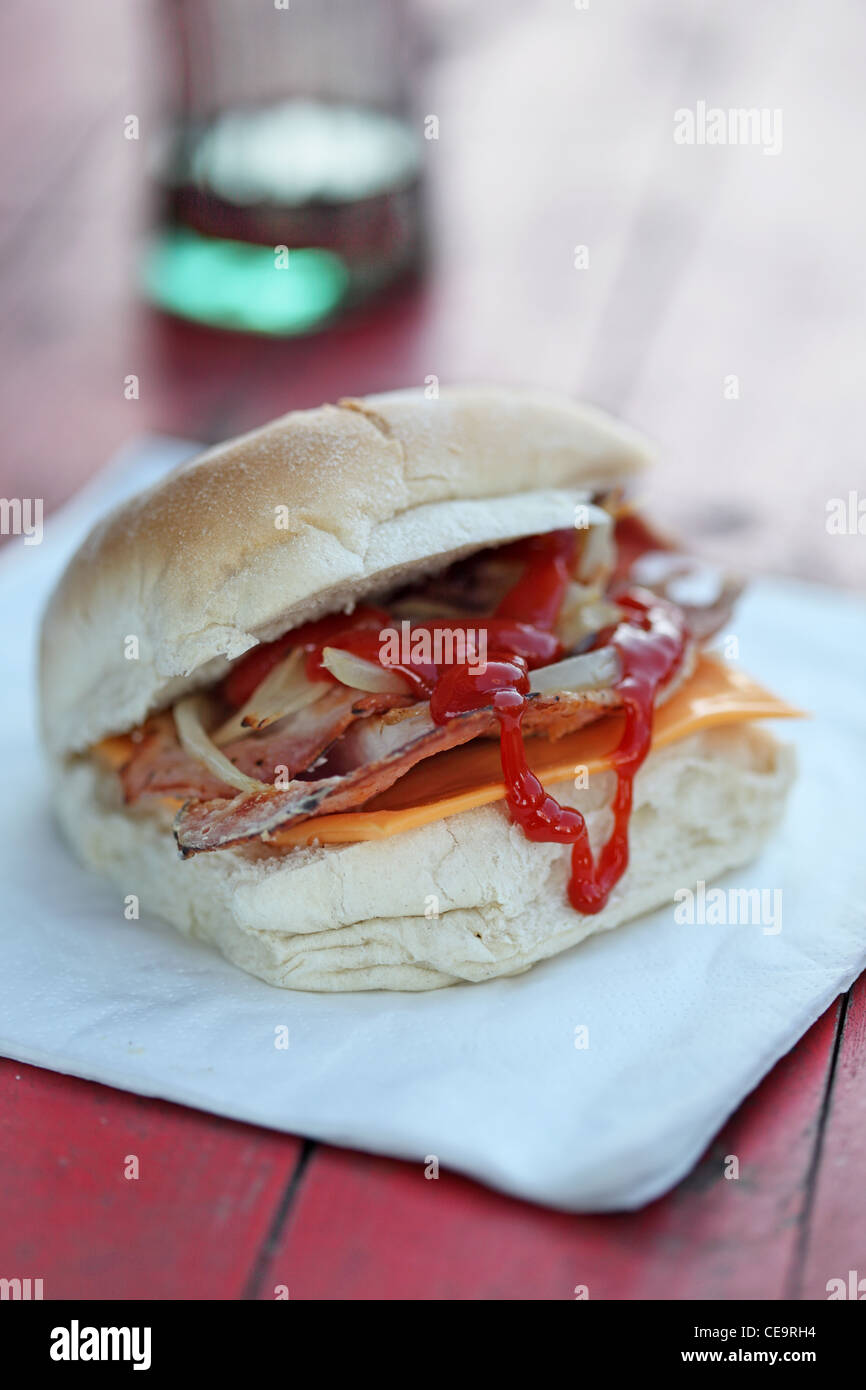 sandwich bacon barm eating on the street Stock Photo - Alamy