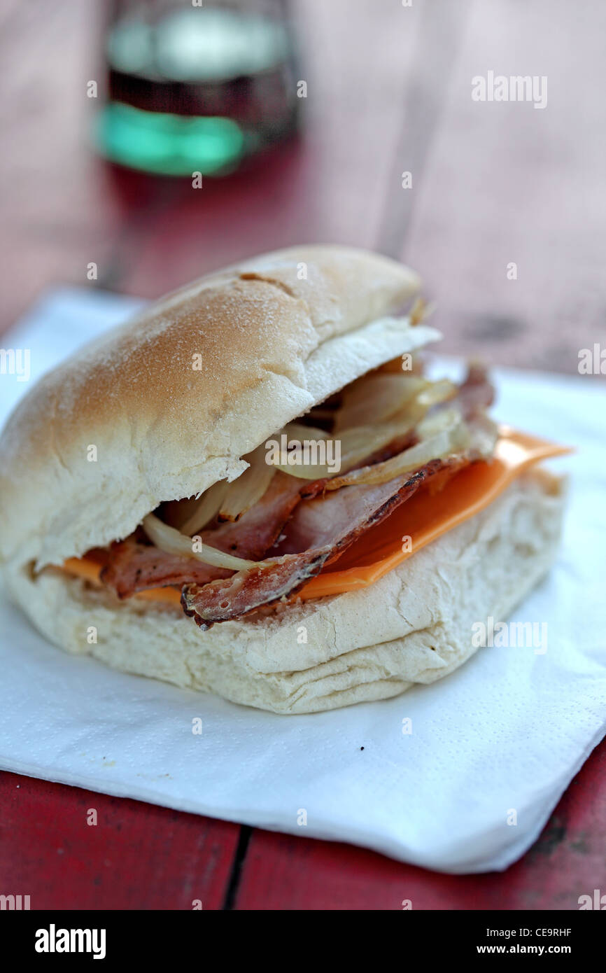 sandwich bacon barm eating on the street Stock Photo - Alamy