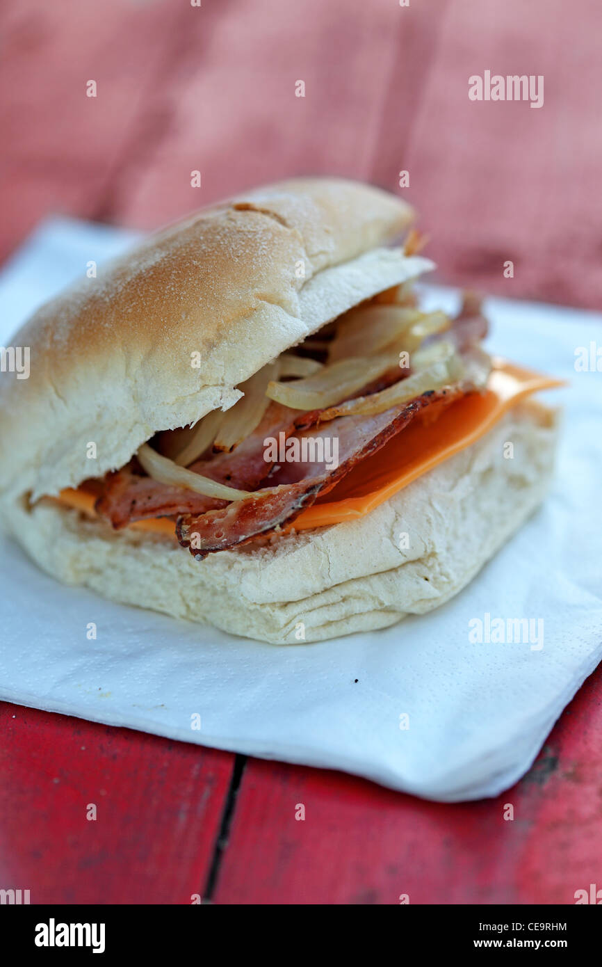 sandwich bacon barm eating on the street Stock Photo - Alamy