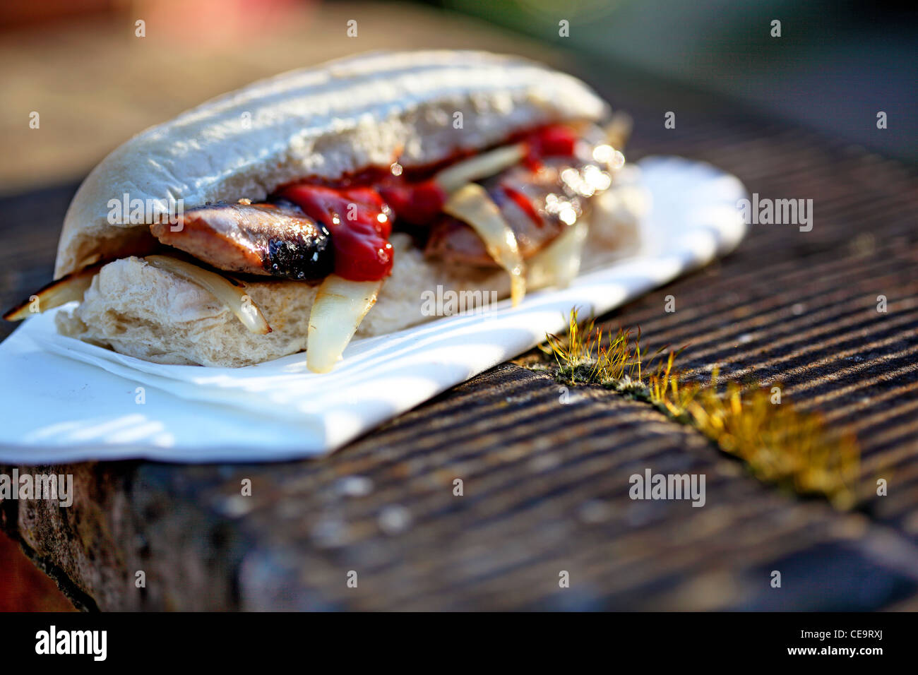 sandwich sausage barm eating on the street Stock Photo - Alamy