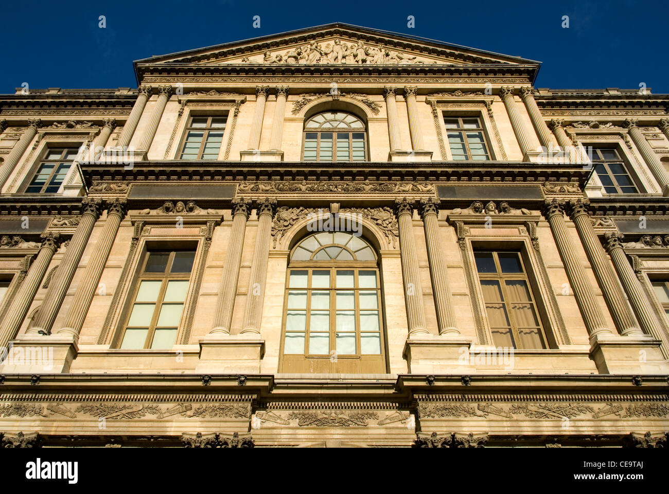 The facade of a stone building in Paris, France Stock Photo - Alamy