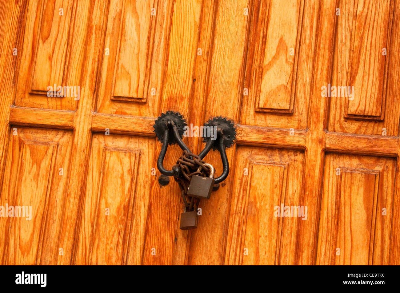Close up of handles with padlock on door, Ayvalik, Turkey Stock Photo ...