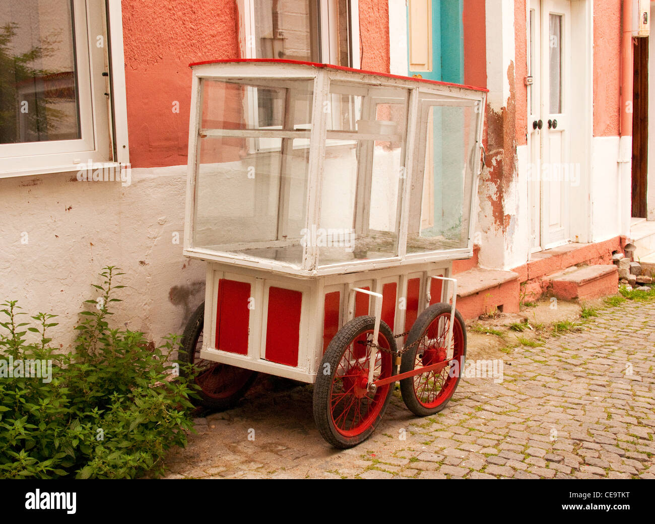 Old food cart sitting on pedestrian street, Ayvalik, Turkey Stock Photo ...