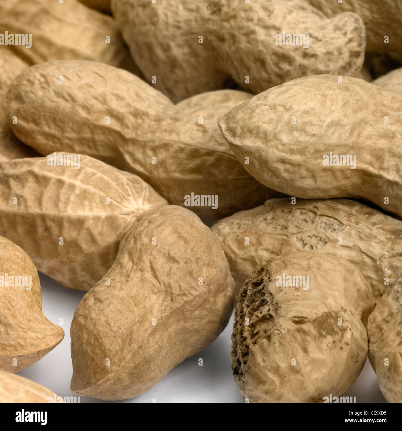 background showing lots of peanuts with paring Stock Photo - Alamy