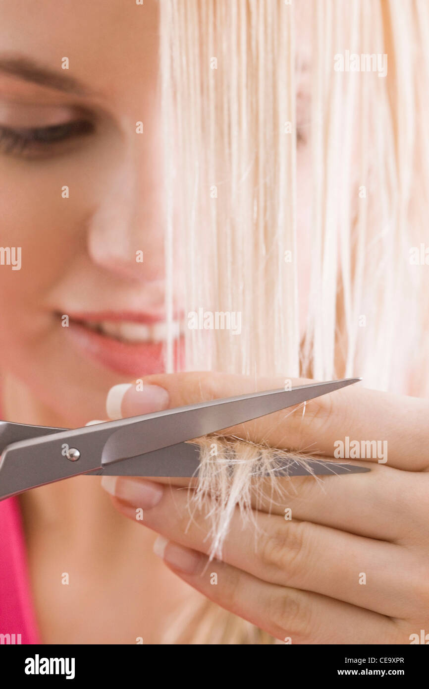 Cutting hair endings hi-res stock photography and images - Alamy