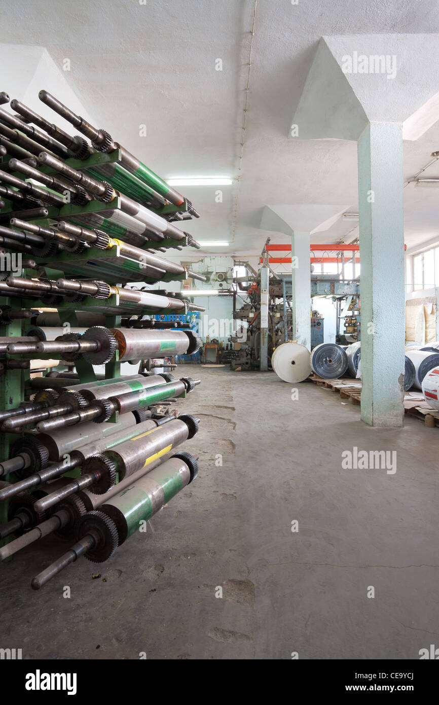 Interior of a factory, old machine for printing Stock Photo - Alamy