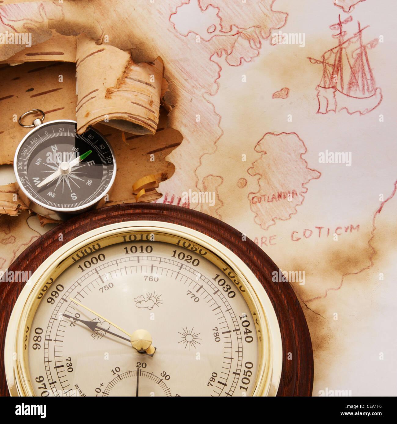 Compass and barometer on old chart of North Europe Stock Photo - Alamy