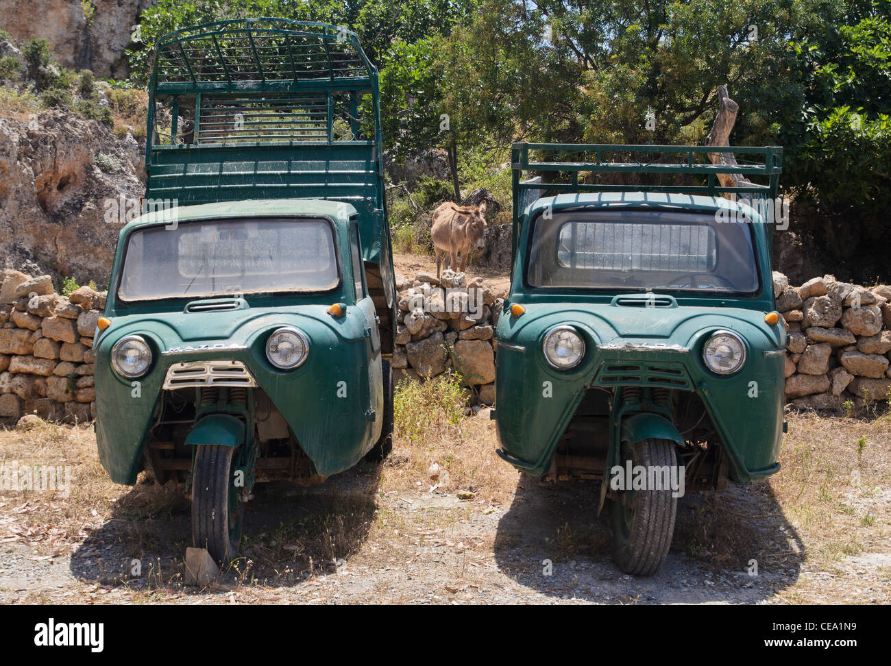 Two Mazda three wheeled trucks, the Mazda T2000, with another form of ...