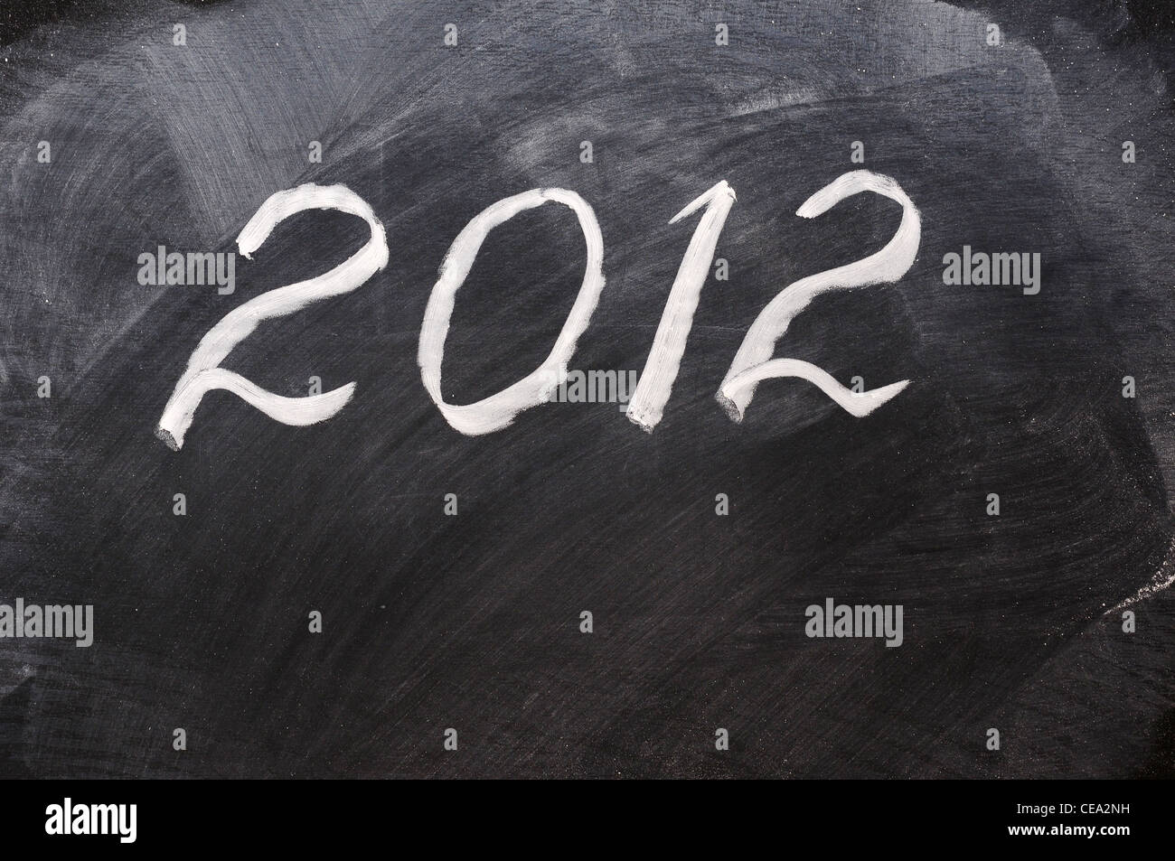 Handwriting of Year 2012 on a blackboard Stock Photo - Alamy