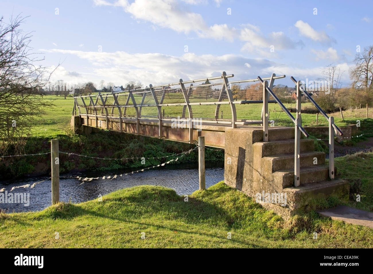 Metal footbridge over stream hi-res stock photography and images - Alamy