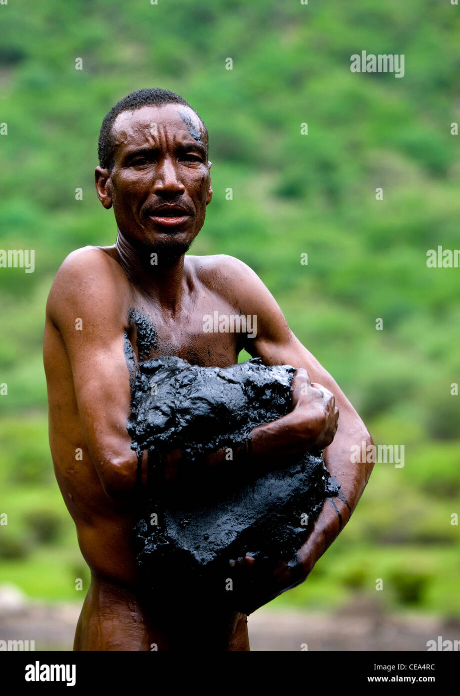 Borana Man Getting Out Of The Crater Lake Of El Sod Volcano With ...
