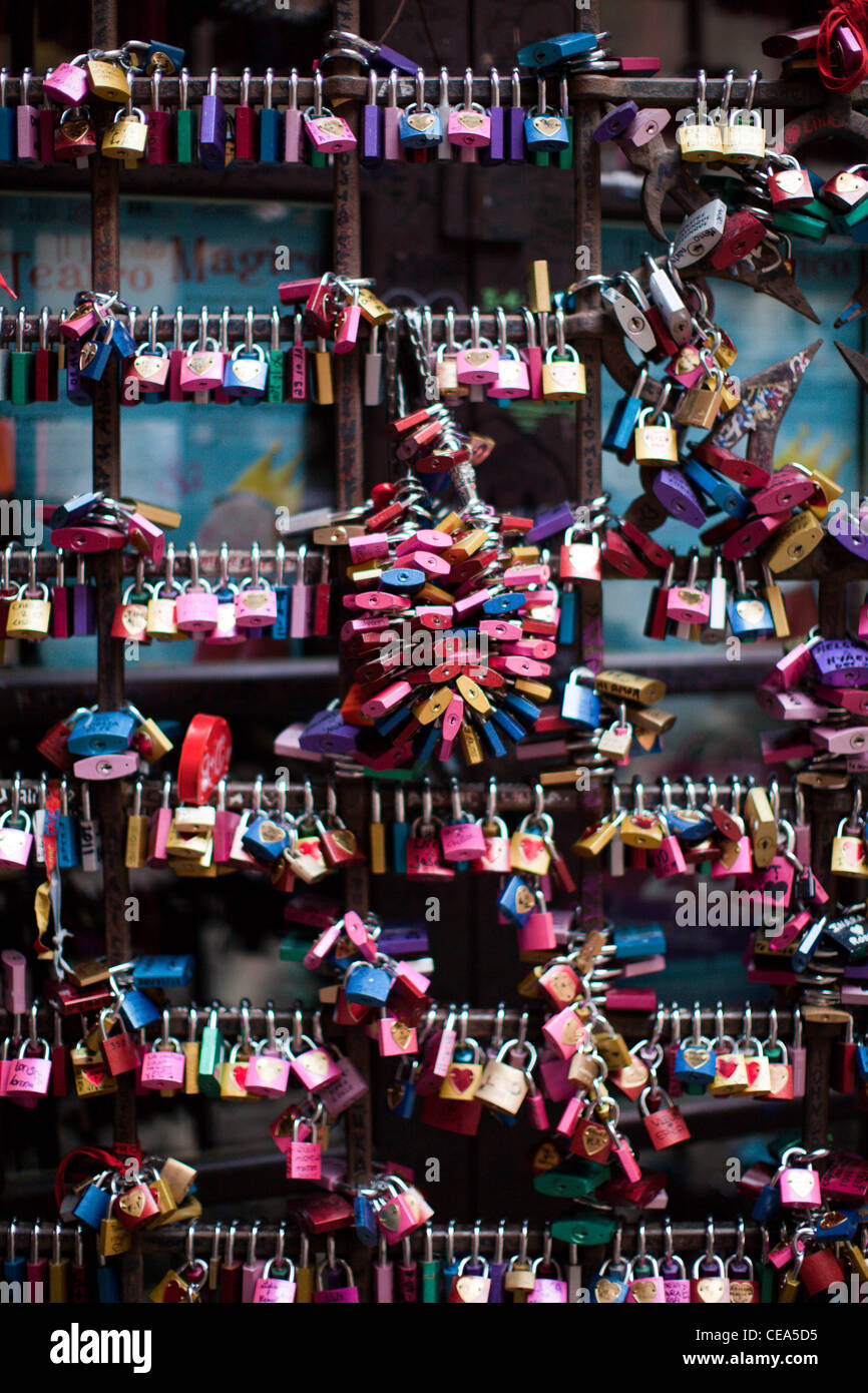Love padlocks attached to an iron gate in the courtyard below Romeo ...