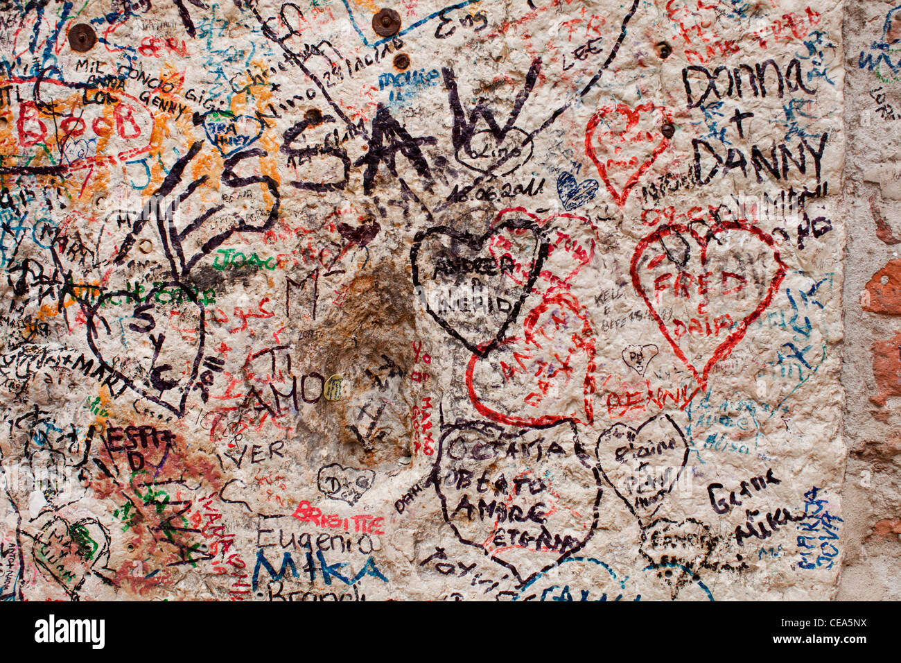 Love graffiti on the walls of the courtyard below Romeo & Juliet's ...