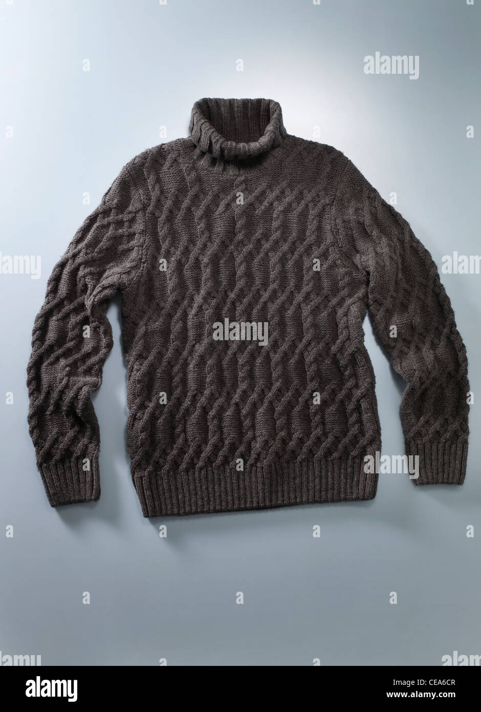 still life shot of a brown aaron turtle neck jumper Stock Photo - Alamy