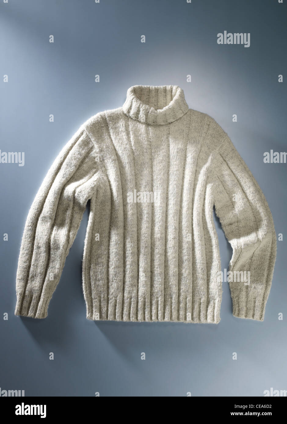 still life shot of a cream or white aaron turtle neck jumper Stock ...