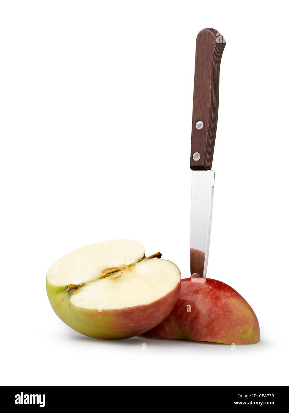 Kitchen knife cutting a red apple - isolated on white background Stock ...