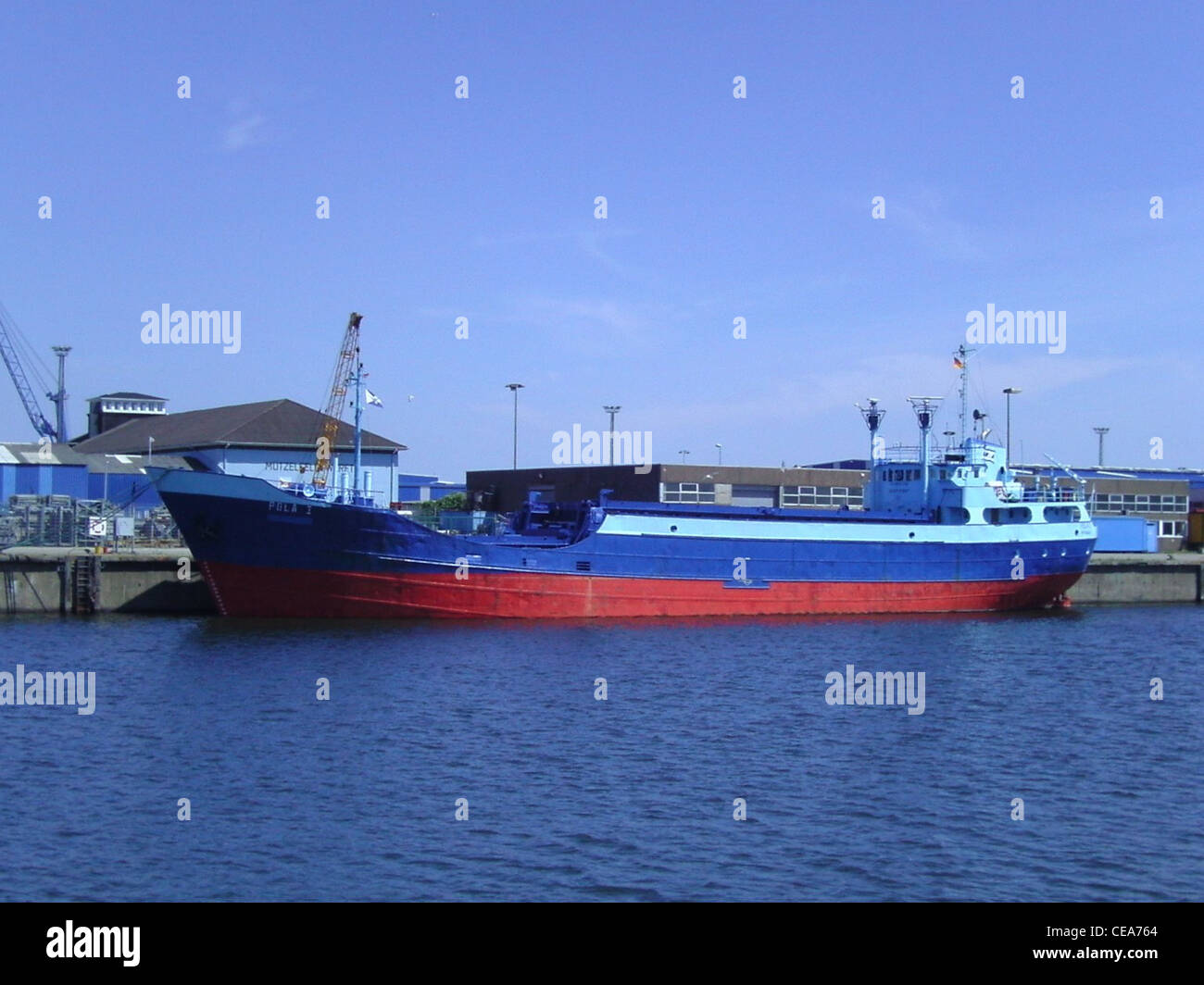 The Coastal Motor Vessel Pola 1 is docked in the port of Cuxhaven. This ...