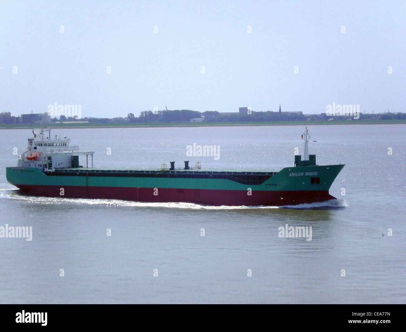 The cargo ship Arklow Bridge is seen outbound on the River Weser. This ...