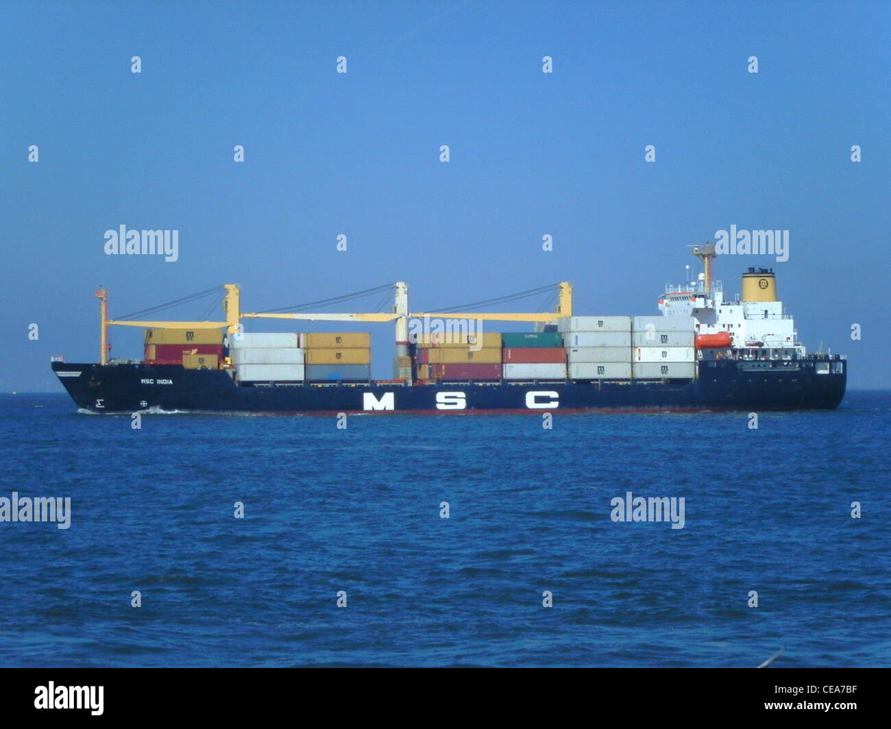 The MSC India is a container cargo ship sailing outbound on the River ...