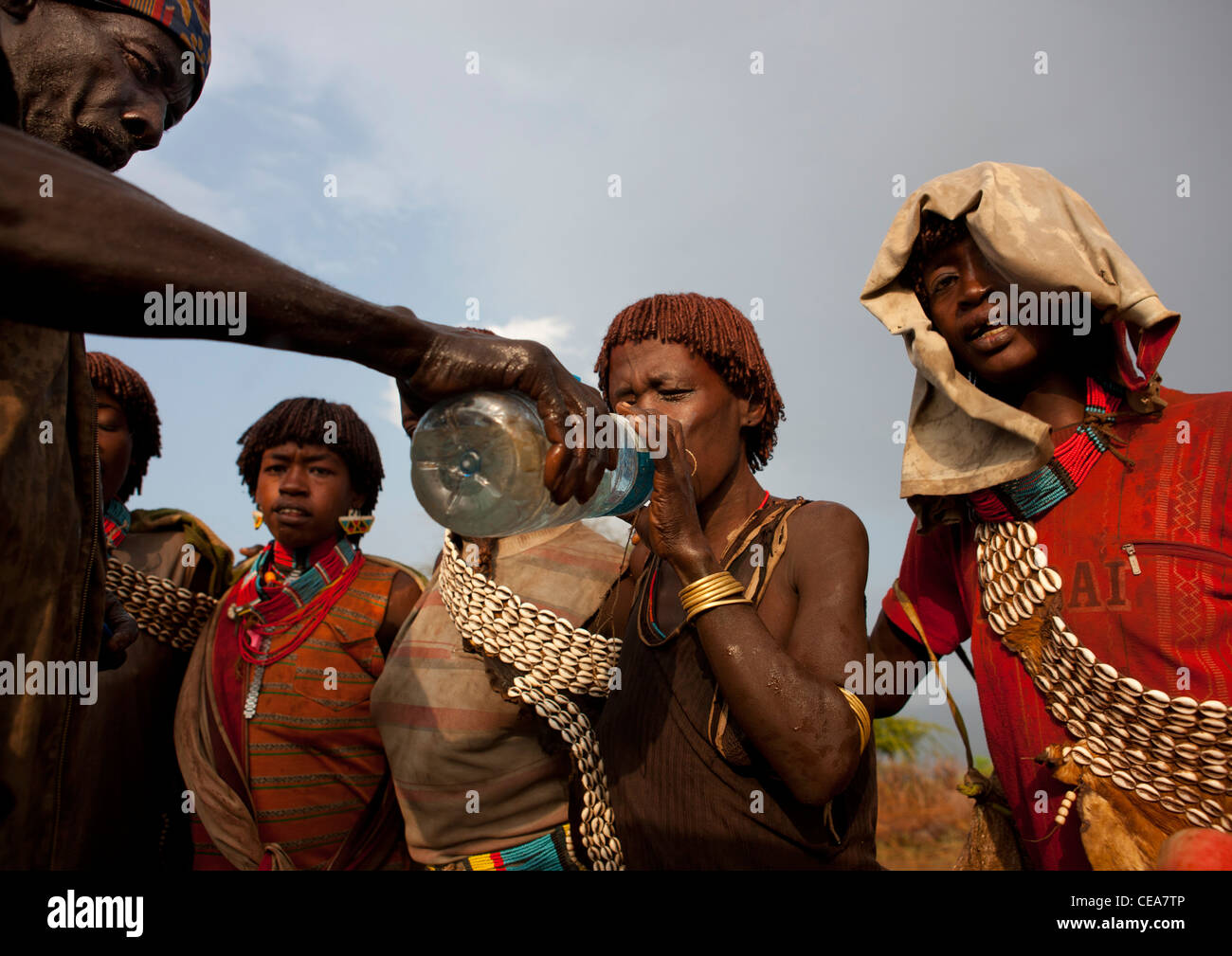Woman Bana Drinks From Plastic Bottle Ethiopia Stock Photo - Alamy
