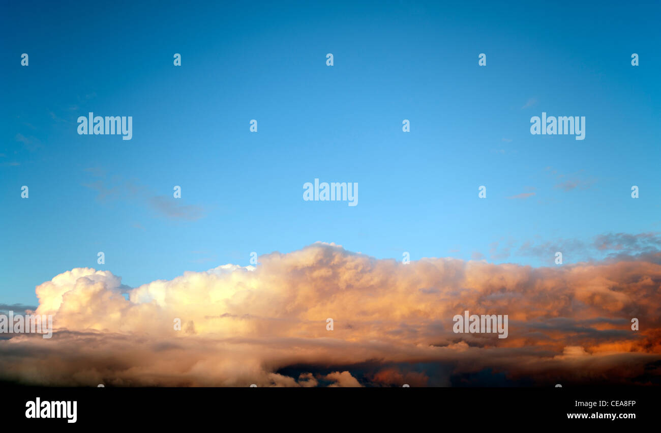 Sunset red clouds with blue sky Stock Photo - Alamy
