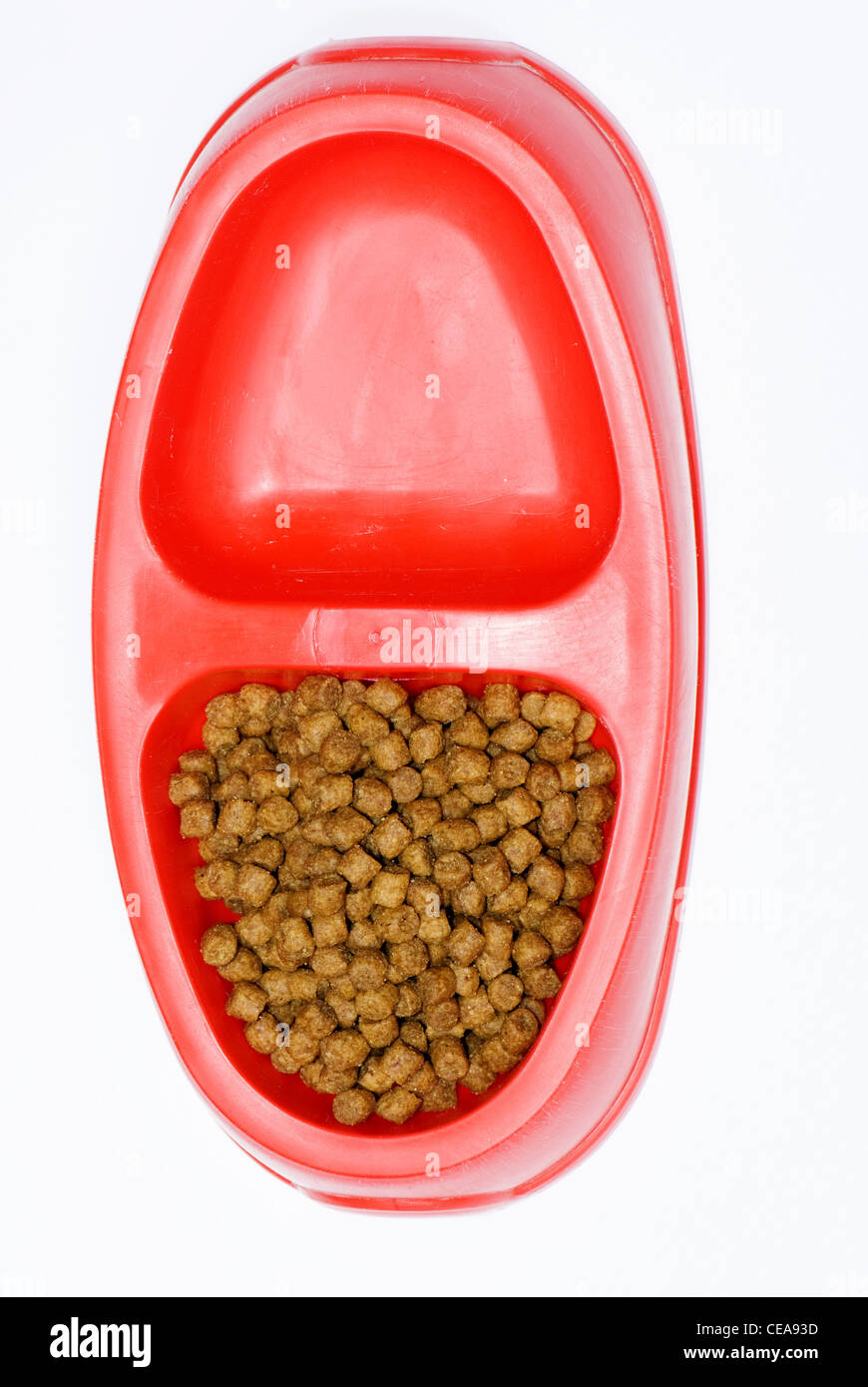 Dried cat food in a red bowl Stock Photo - Alamy