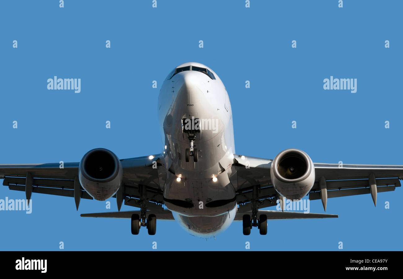 Two engines jet Airplane before landing Stock Photo - Alamy
