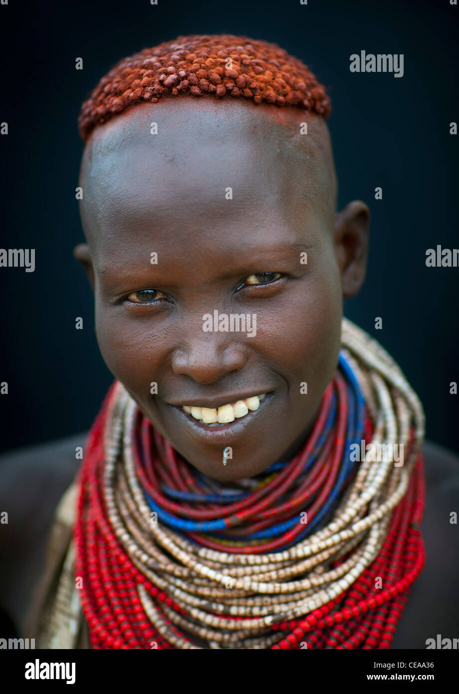 Portrait Of Beautiful Dark Eyed Karo Woman Wearing Beaded Necklace ...