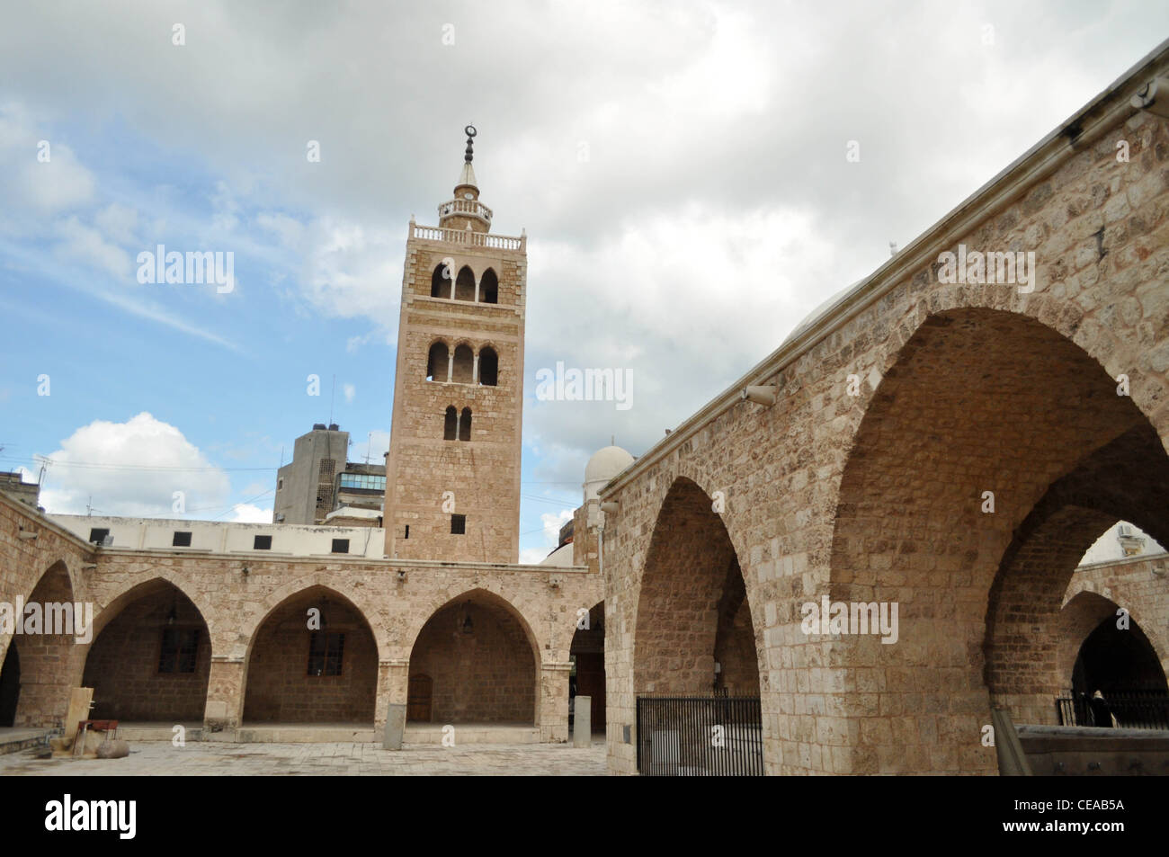 Courtyard and minaret of the Mansouri Great Mosque in Tripoli, Lebanon ...