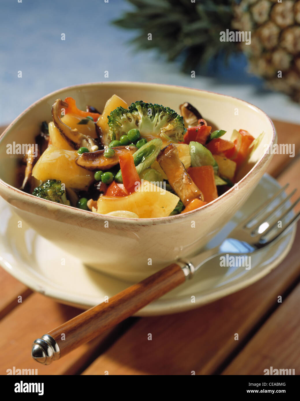 Chinese vegetabels sweet - sour out of the wok Stock Photo - Alamy