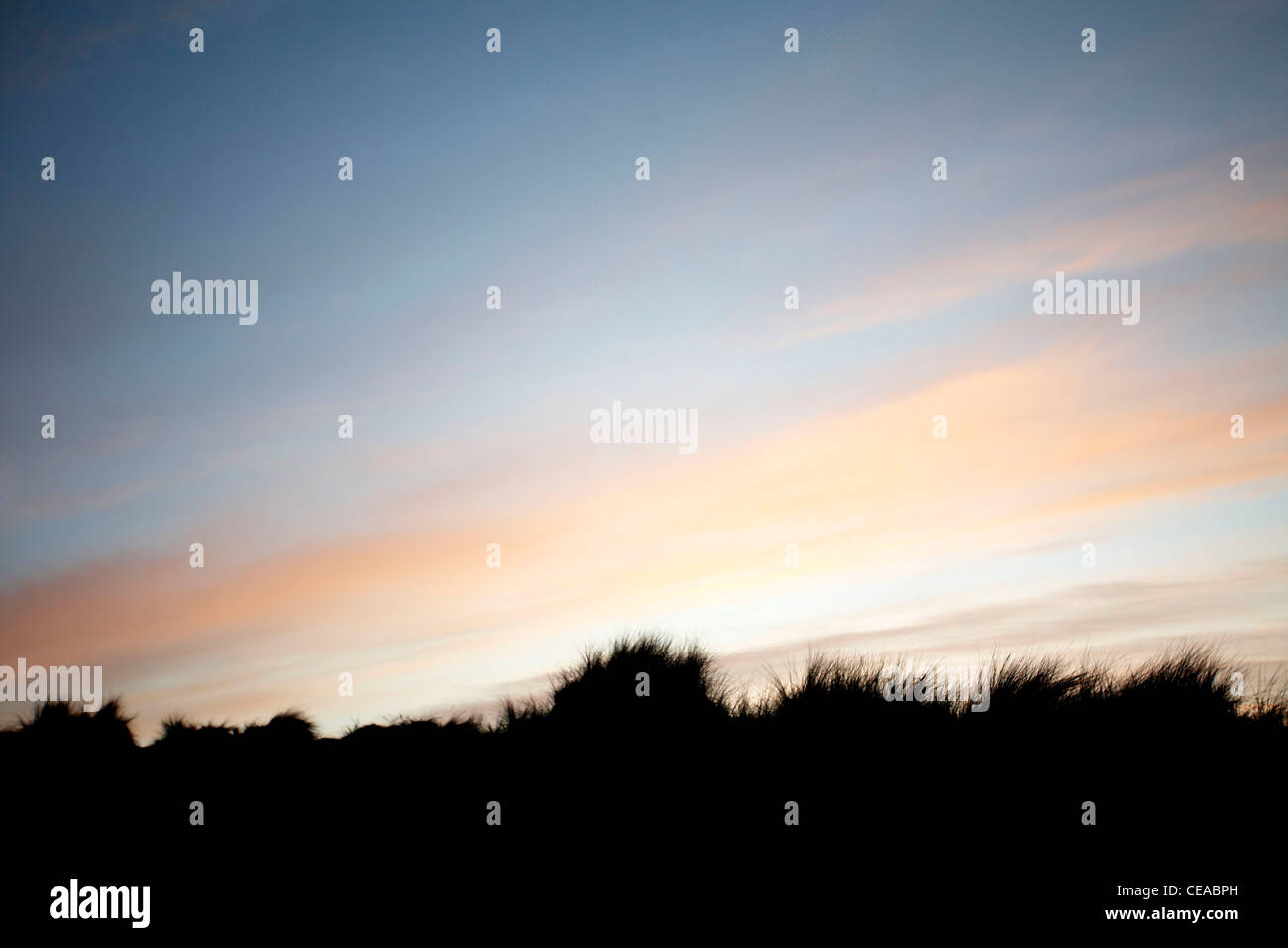 Sunsetting in clouds hi-res stock photography and images - Alamy