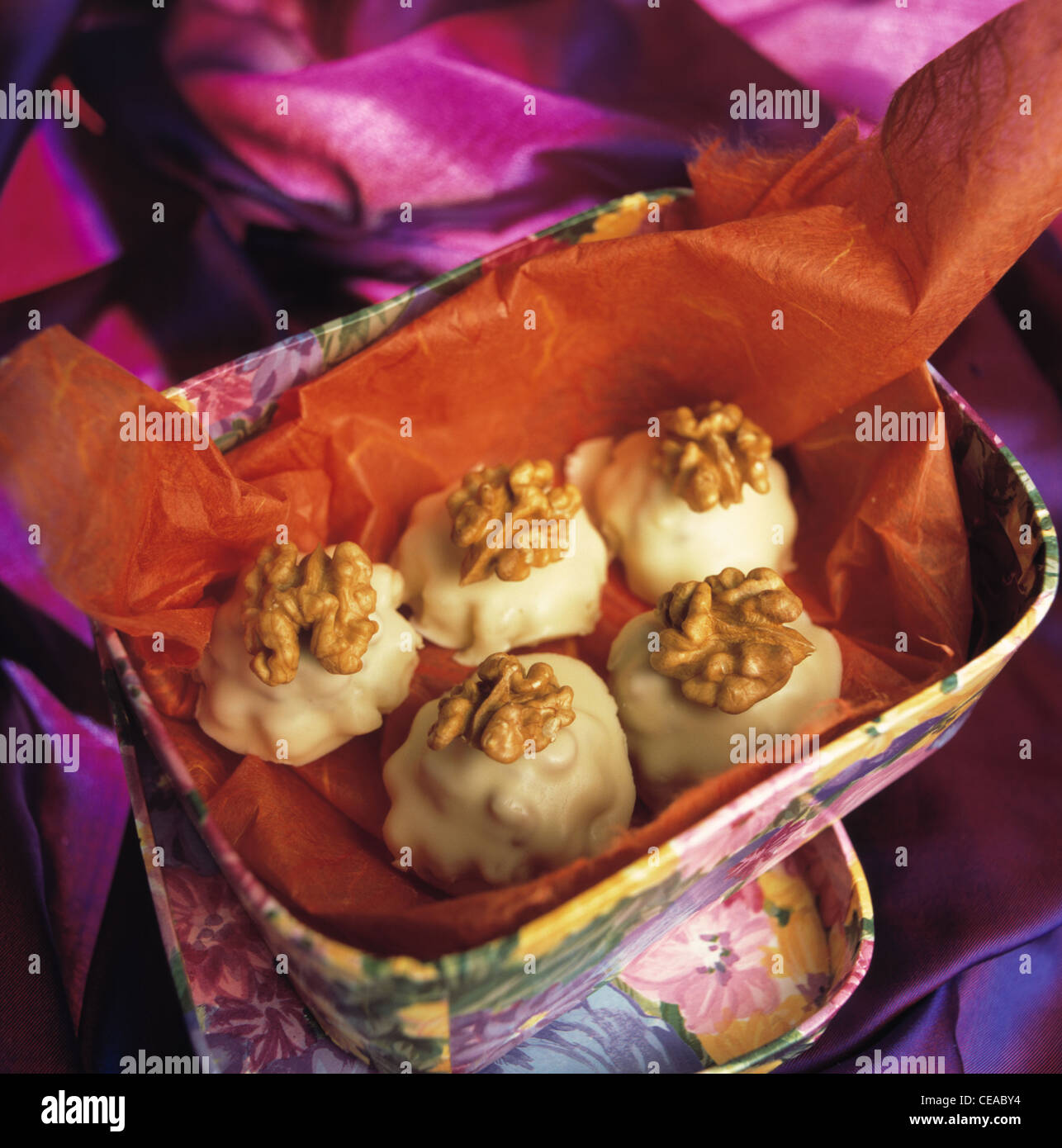 Walnut candies with almond paste Stock Photo - Alamy